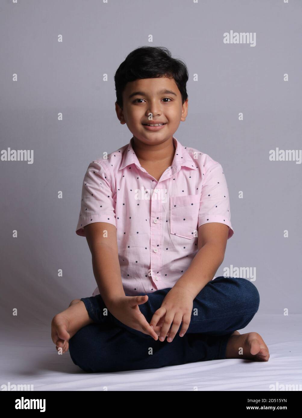 Handsome indian male sitting on hi-res stock photography and images - Alamy