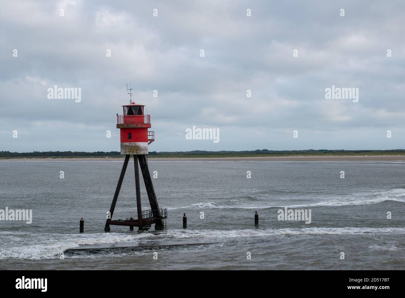 Watchtower at the sea under the cloudy sky Stock Photo - Alamy