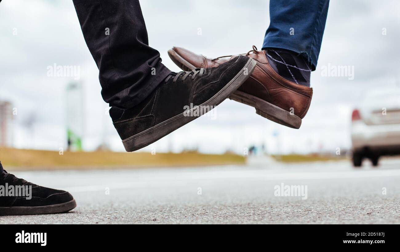 close up. two young men greeting each other on a city street Stock ...