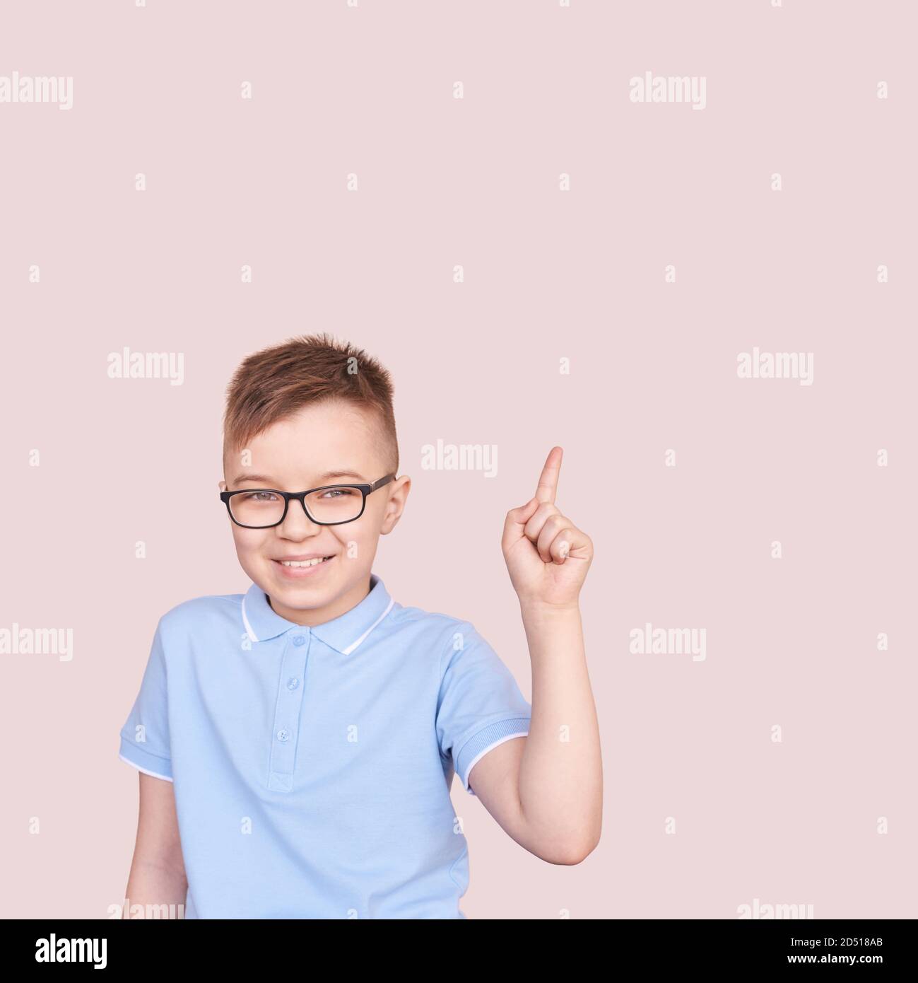 Pretty young student pointing. Elementary school children Stock Photo ...