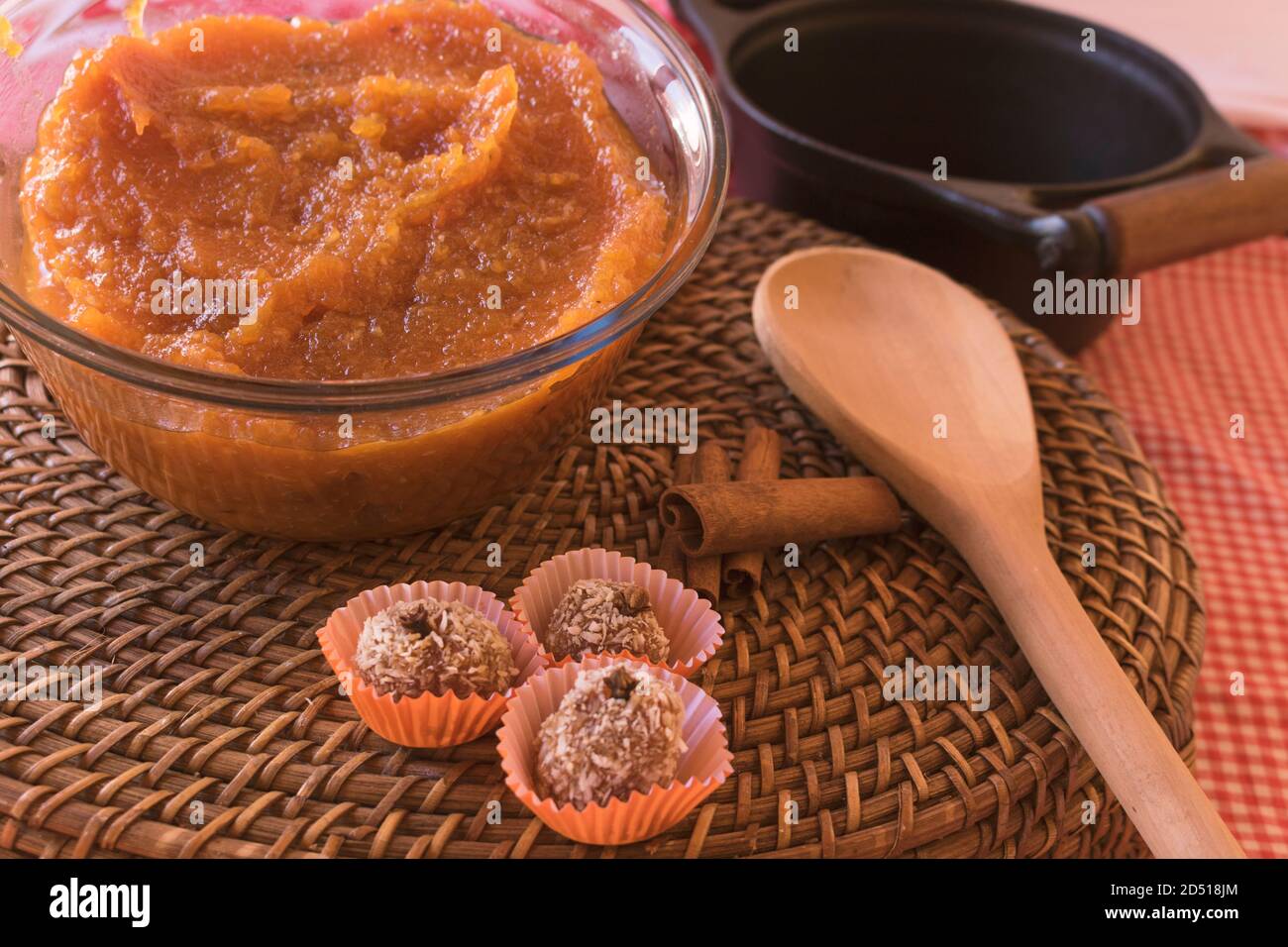 Brazilian dessert sweet of pumpkin, coconut and cinnamon in a bowl and ...