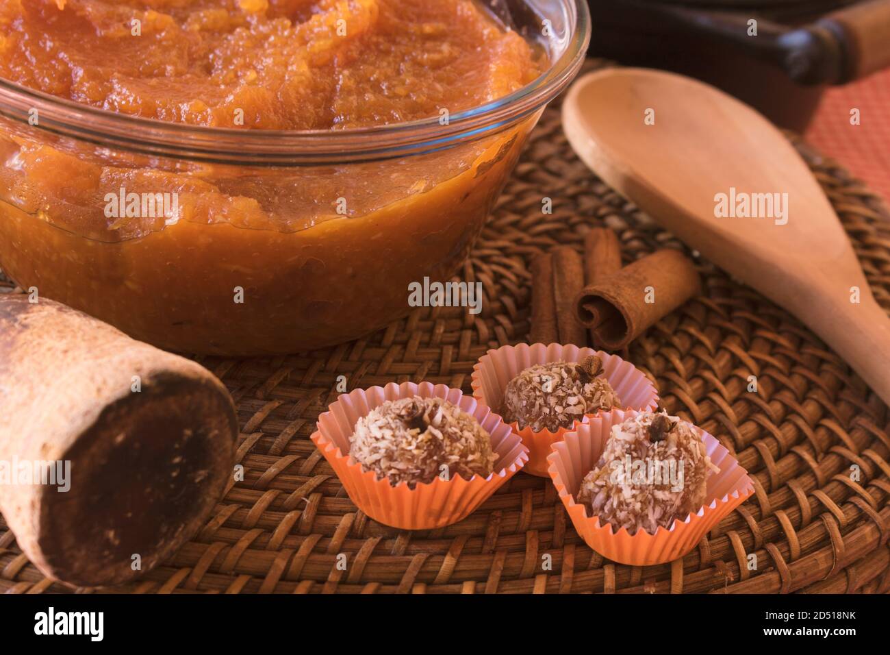 Brazilian dessert sweet of pumpkin, coconut and cinnamon in a bowl and ...
