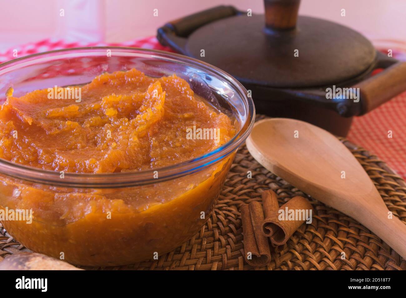 Brazilian dessert sweet of pumpkin, coconut and cinnamon in a bowl and ...