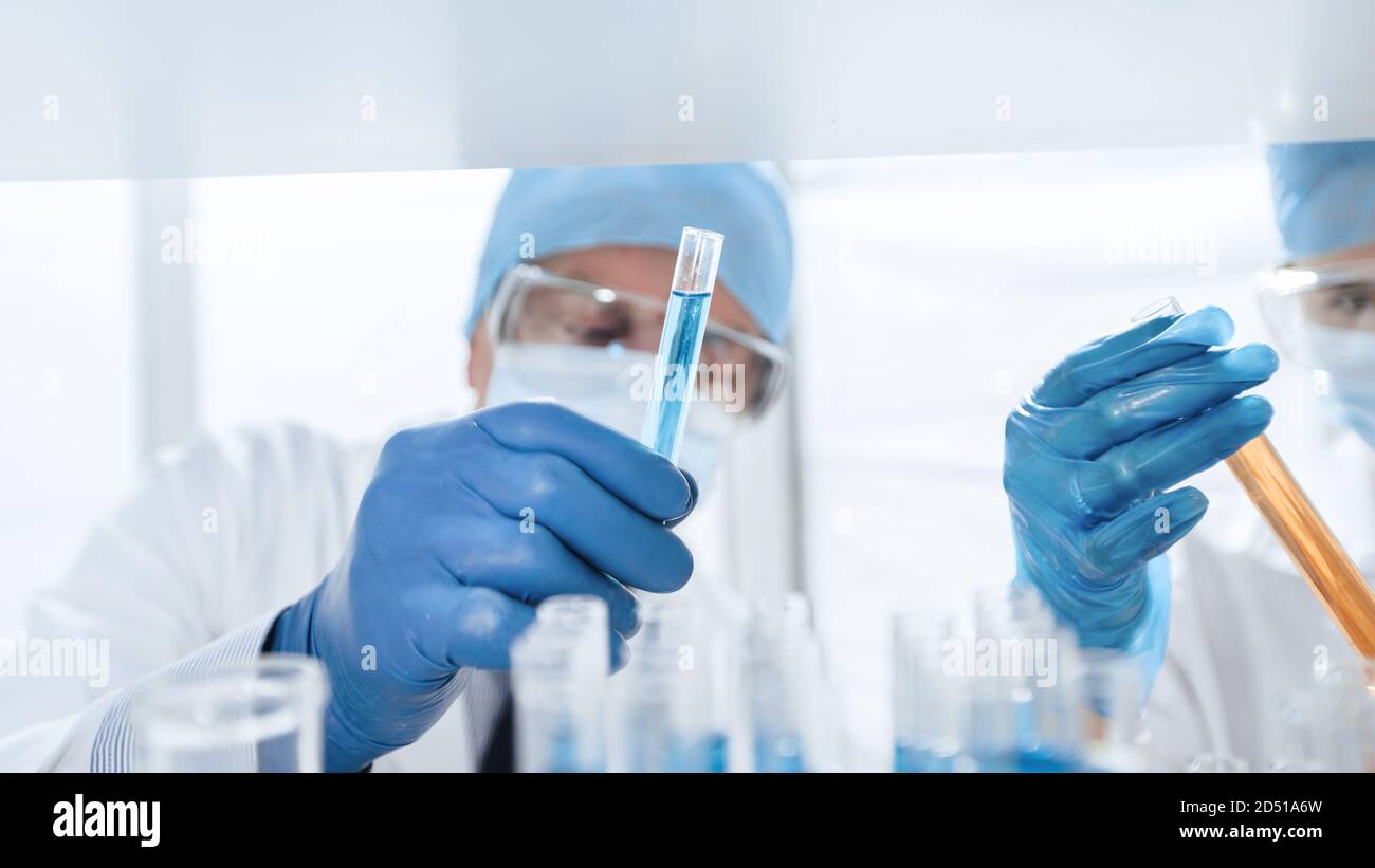 close up. scientists with test tubes in a biochemical laboratory Stock ...