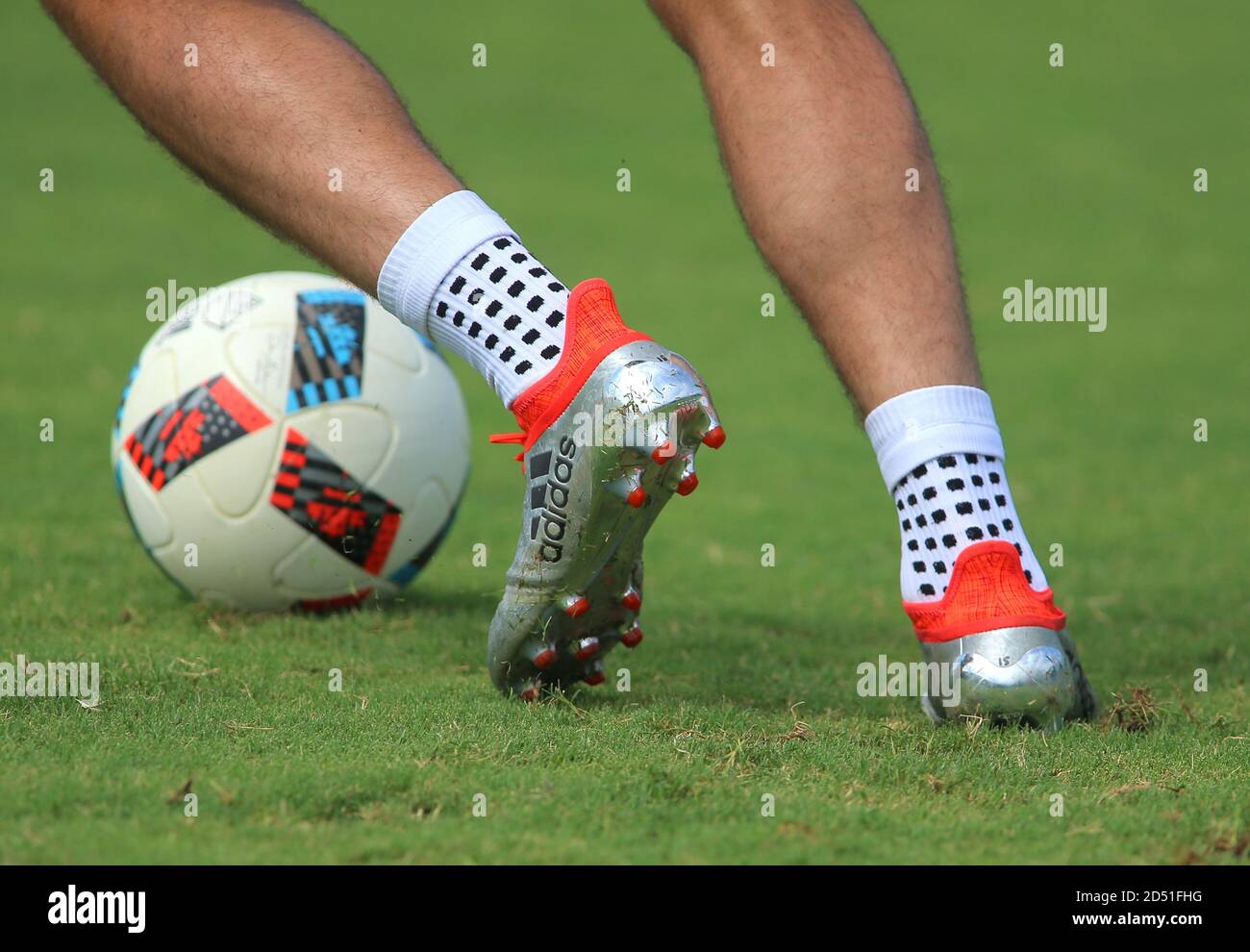 Soccer player dribbling the ball Stock Photo - Alamy