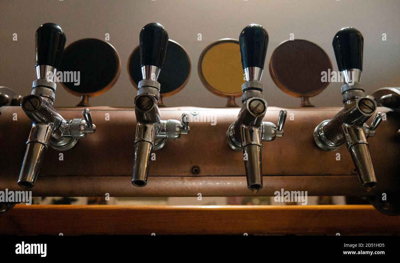 The beer taps in a pub. Nobody. Alcohol concept. Vintage style. Beer ...