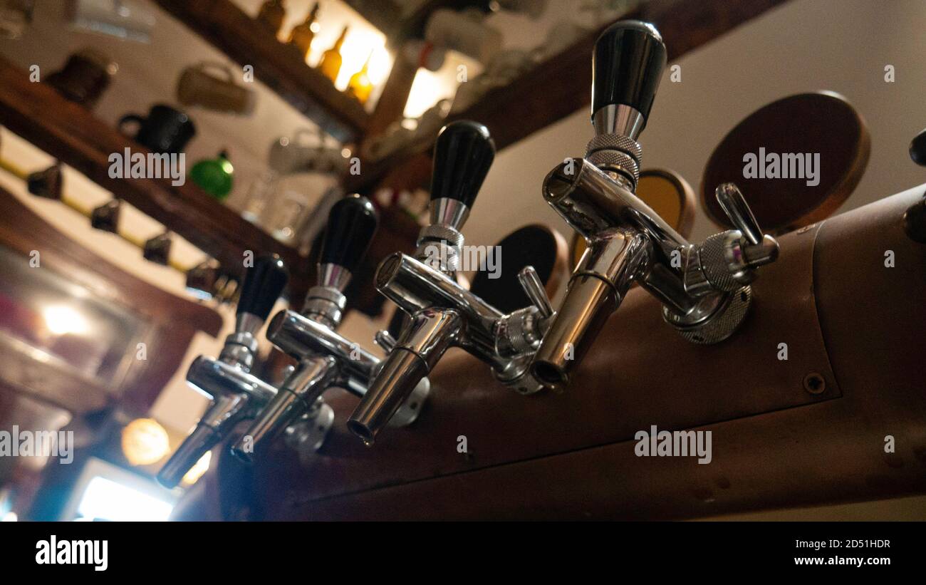 The beer taps in a pub. Nobody. Alcohol concept. Vintage style. Beer ...