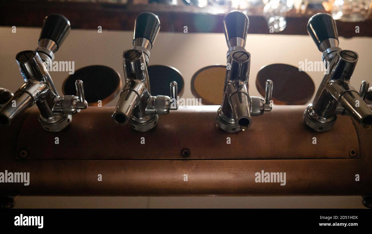 The beer taps in a pub. Nobody. Alcohol concept. Vintage style. Beer ...