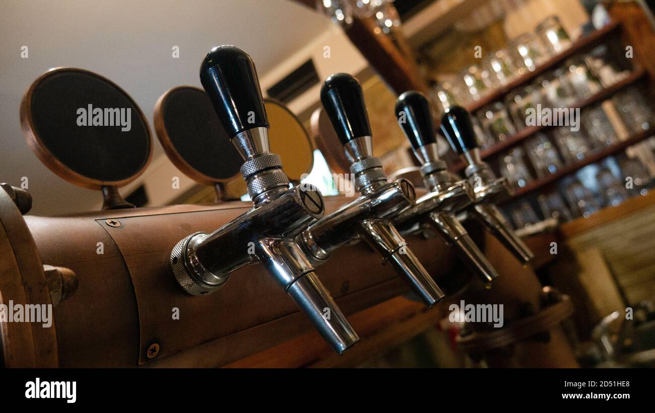 The beer taps in a pub. Nobody. Alcohol concept. Vintage style. Beer ...