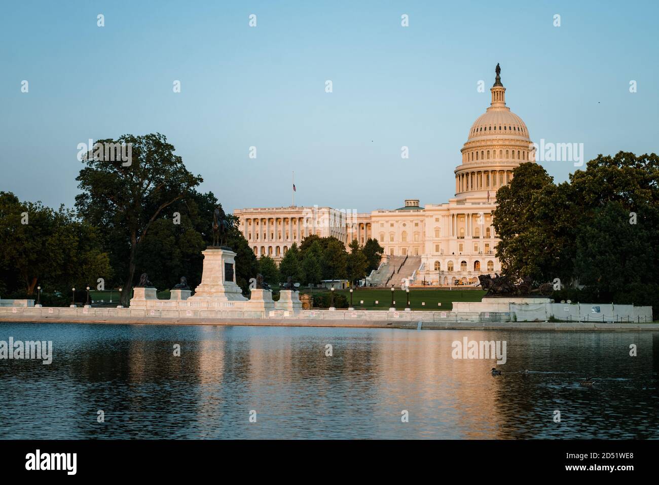 View of the US Capitol Building across Reflecting Pool Stock Photo - Alamy