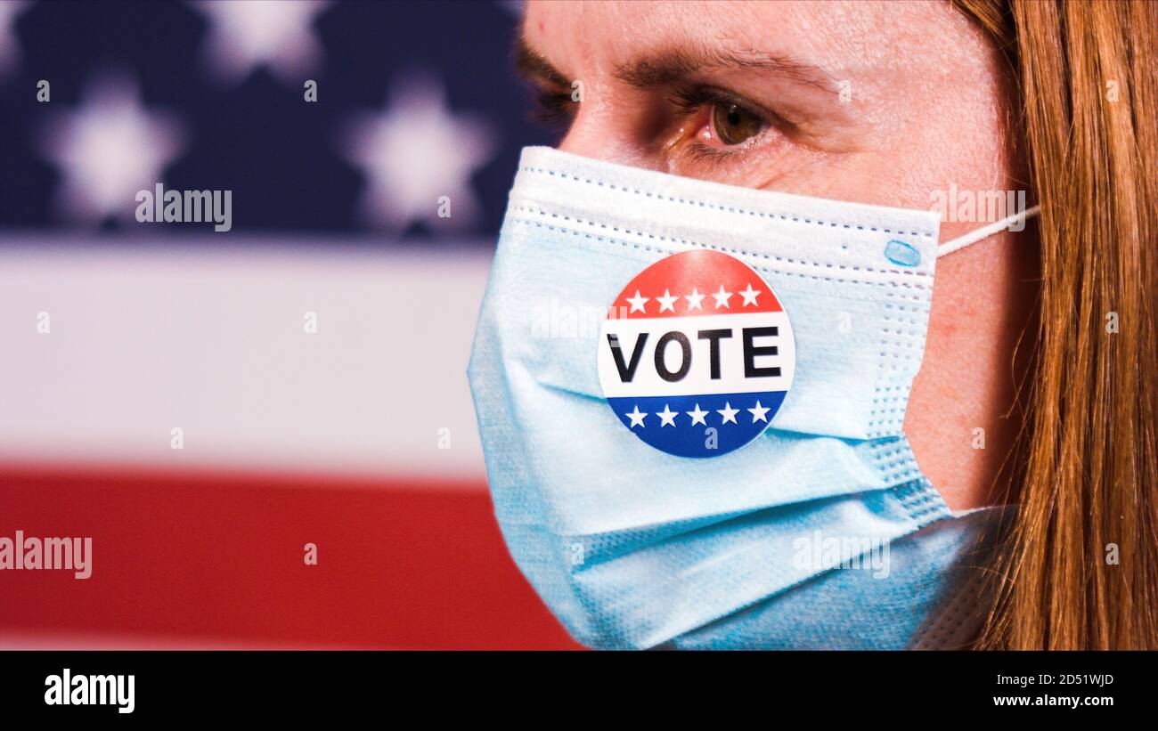 Woman putting voted today badge hi-res stock photography and images - Alamy