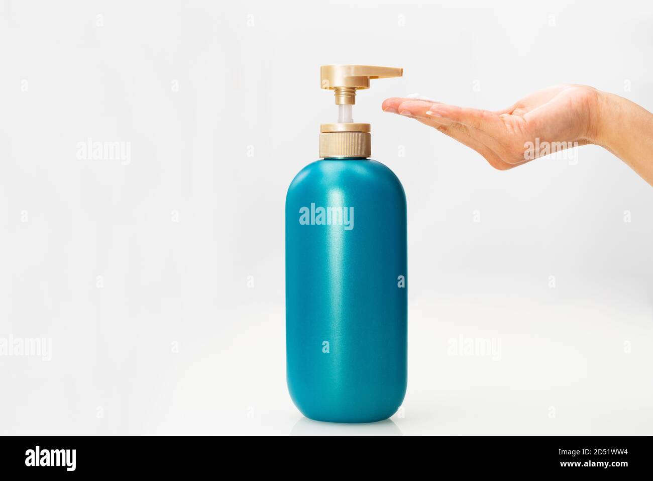women hand apply hair shampoo conditioner bottle on white background ...