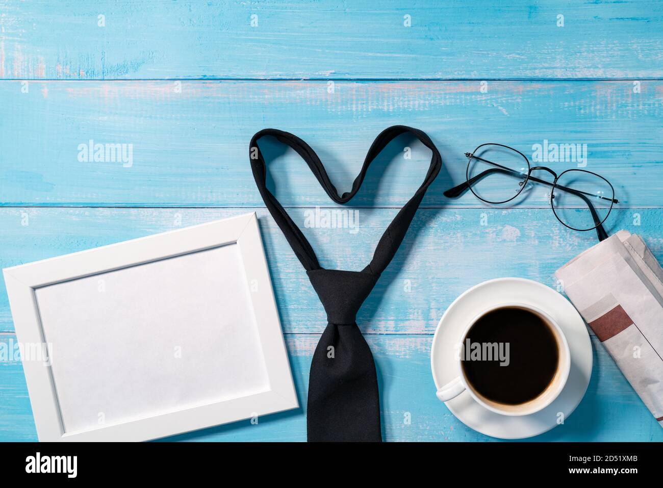 necktie with a cup of coffee and eyeglasses Stock Photo - Alamy