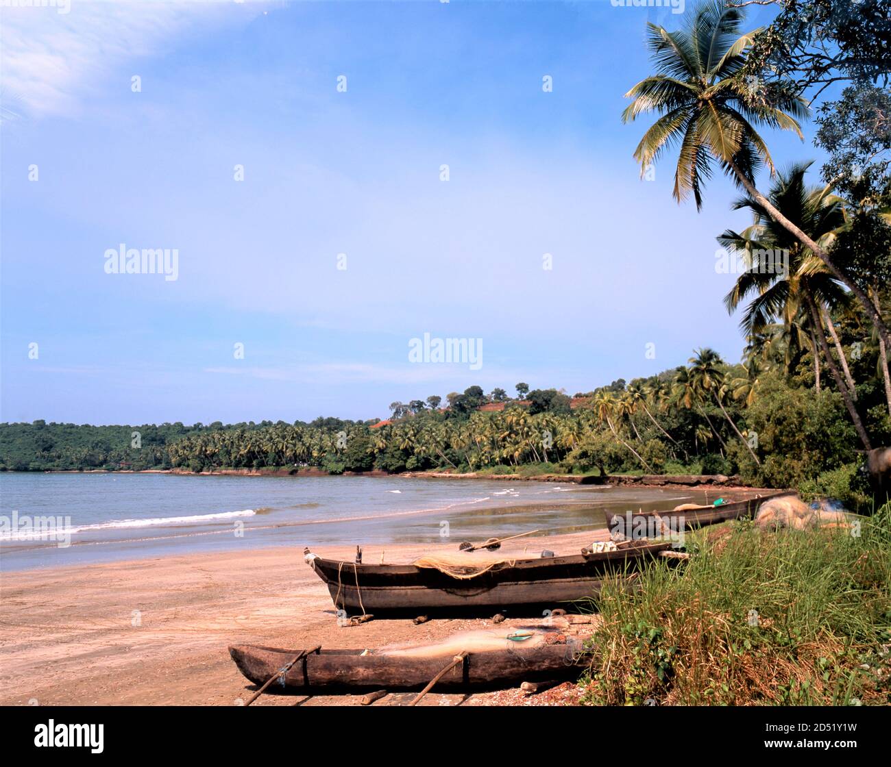Boats on Bambolim beach Goa Stock Photo - Alamy