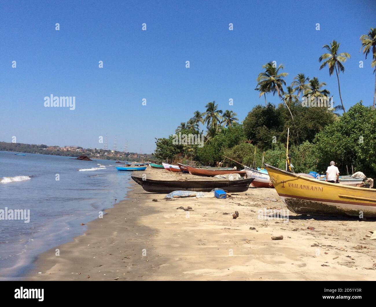 Boats on Bambolim beach Goa India Stock Photo - Alamy