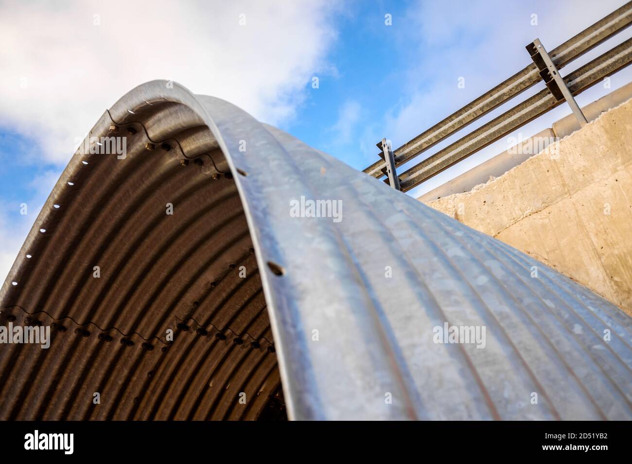 Metallic structures on the edge of a road guardrail Stock Photo - Alamy