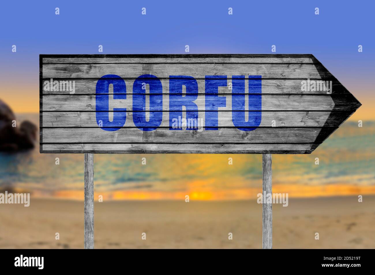 Corfu wooden sign with beach background Stock Photo - Alamy