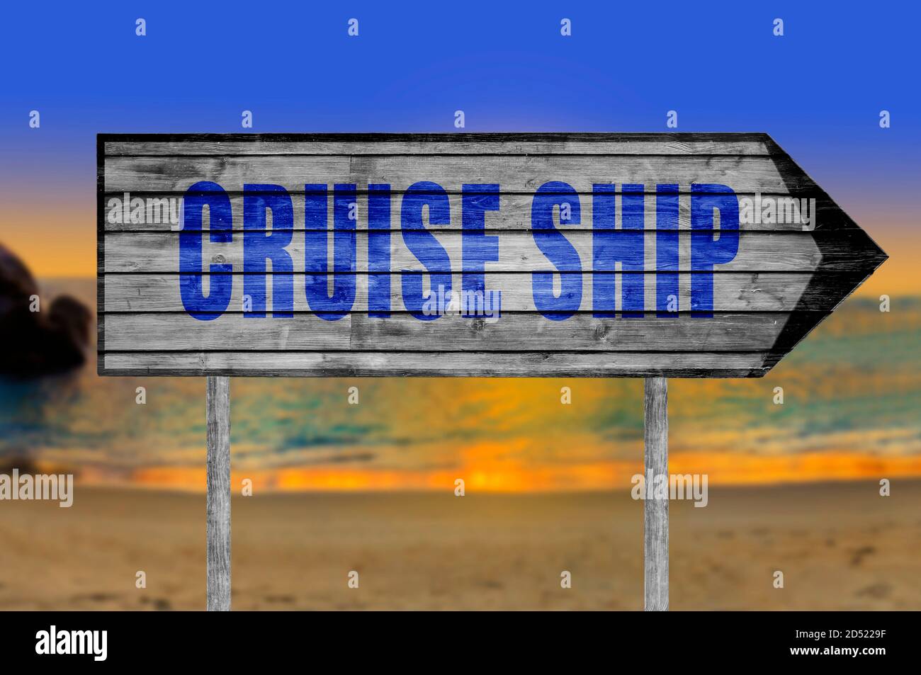 Cruise Ship wooden sign with on a beach background Stock Photo - Alamy