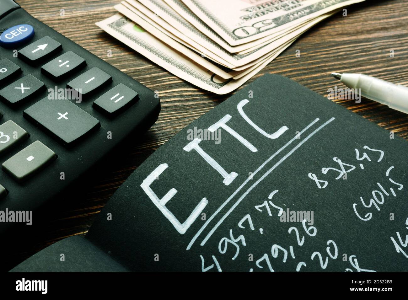 EITC Earned income tax credit calculations on the page Stock Photo - Alamy