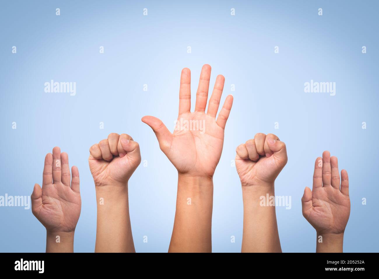 Raise hand up hi-res stock photography and images - Alamy