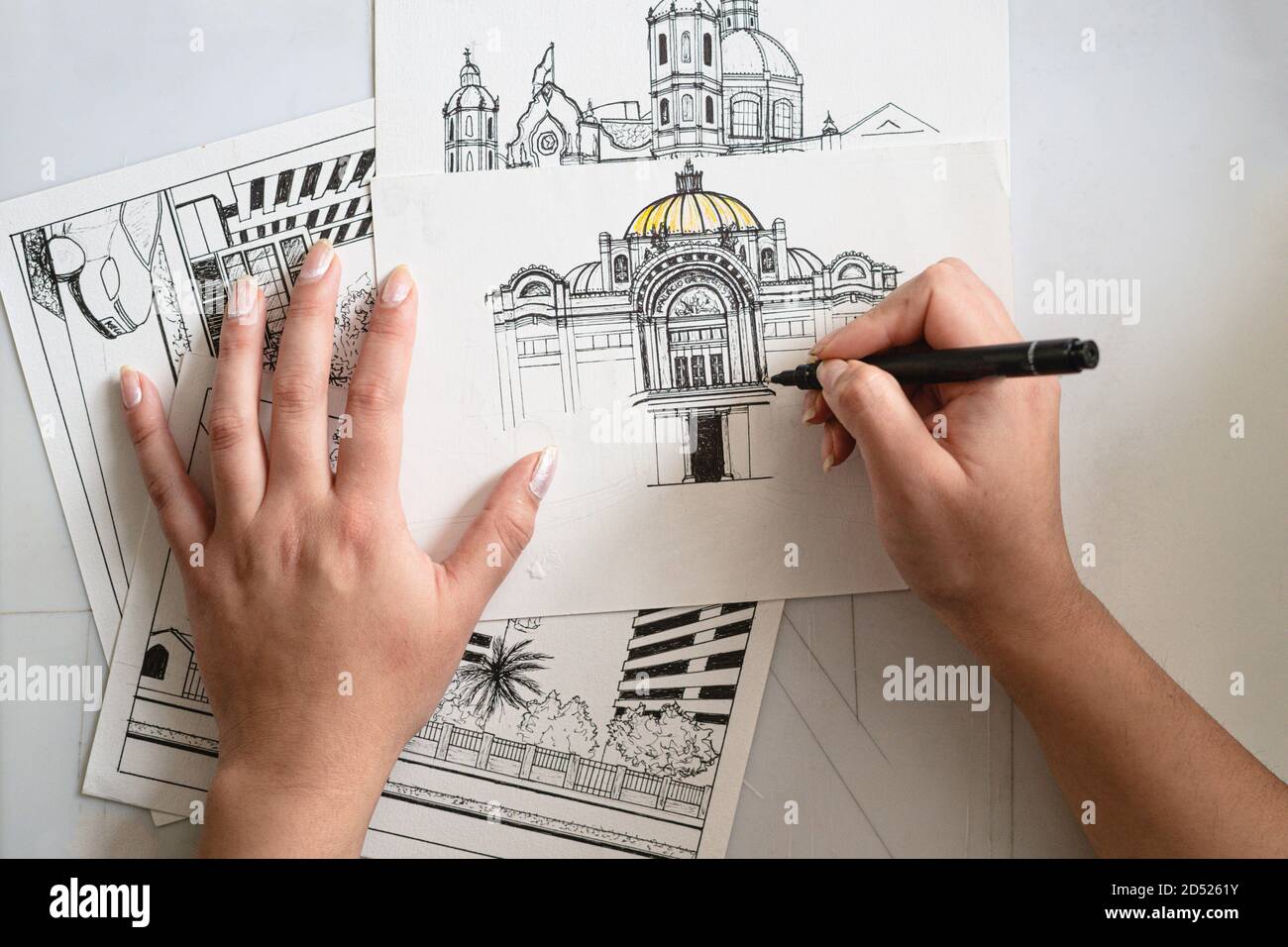 Hands drawing architecture and design Stock Photo - Alamy