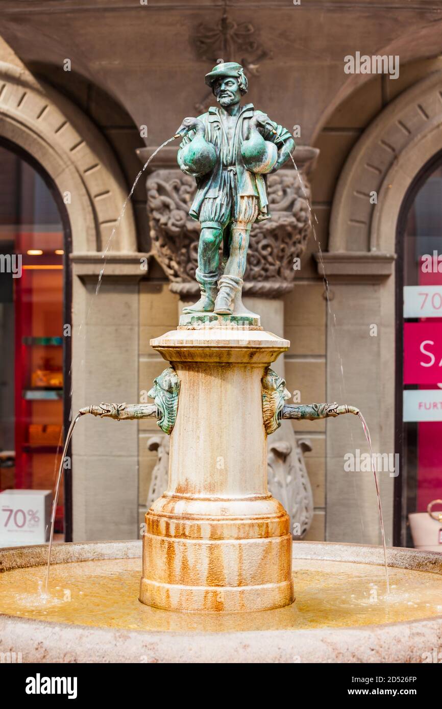 The Little Goose Man fountain at Hirschenplatz main square in Lucerne ...