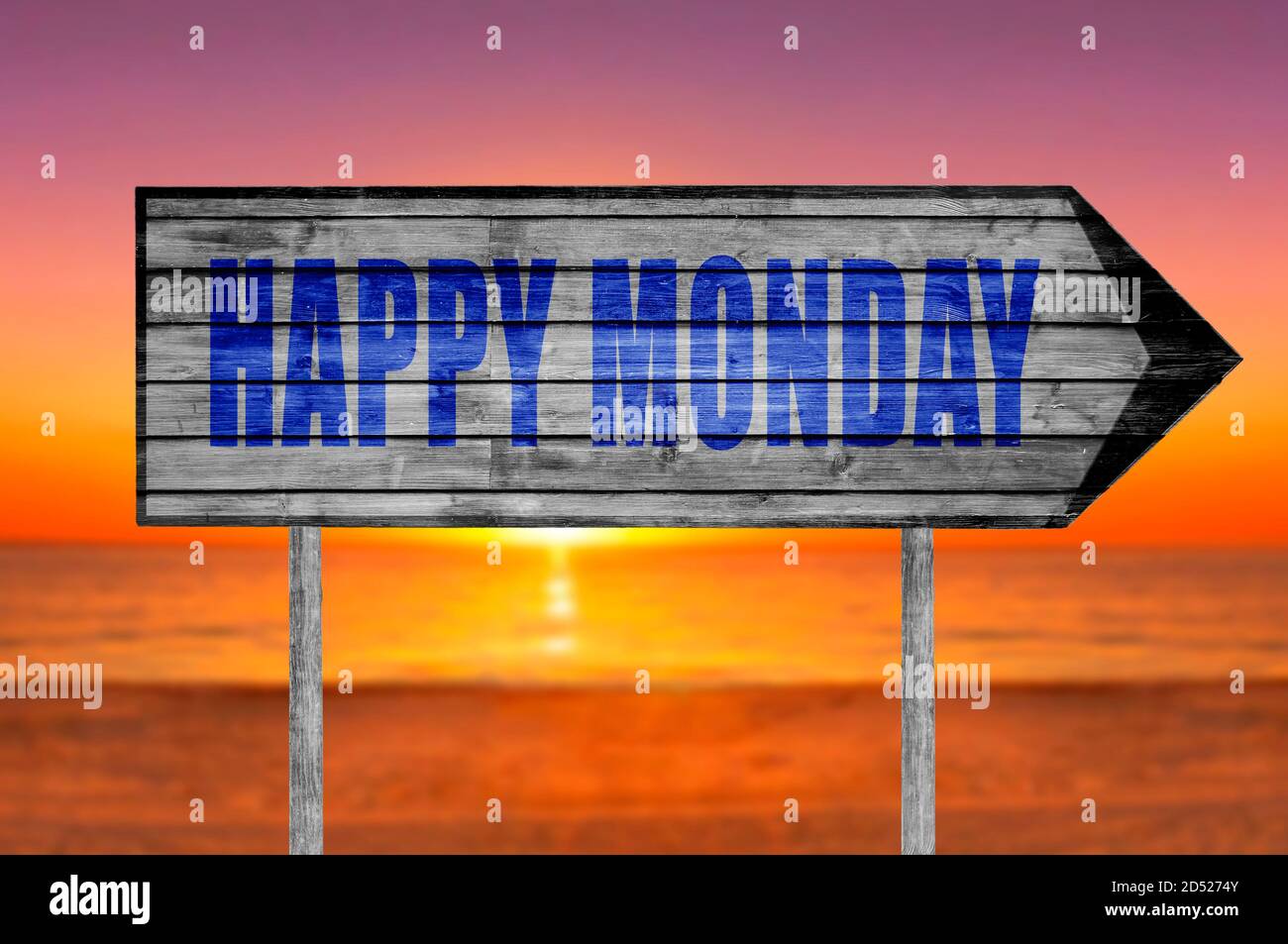 Happy Monday wooden sign with a beach on background Stock Photo - Alamy