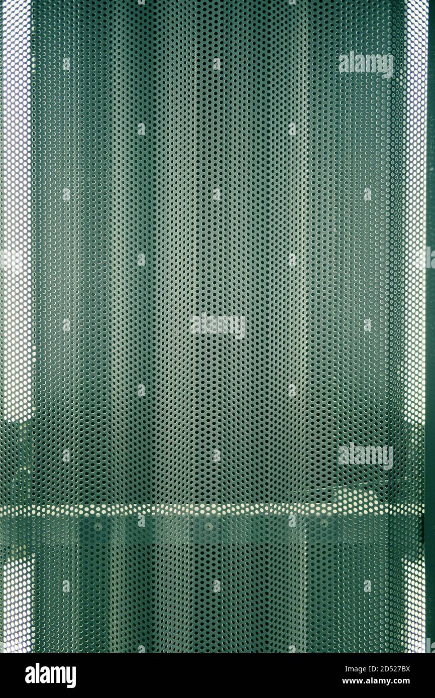 Background of a metal irregular lattice with a curved surface Stock ...