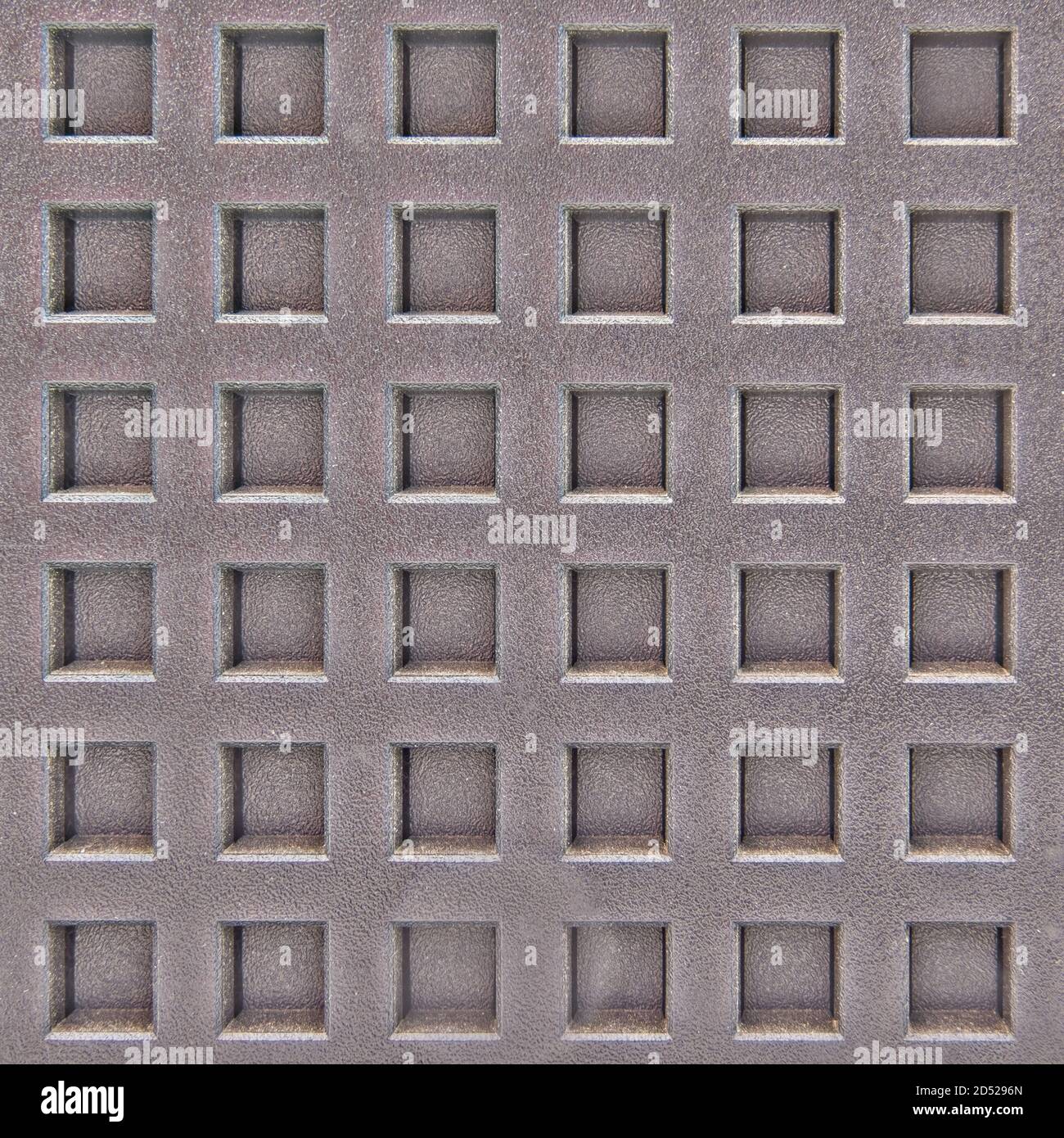 Background square metal surface with uniform notches, iron texture with ...