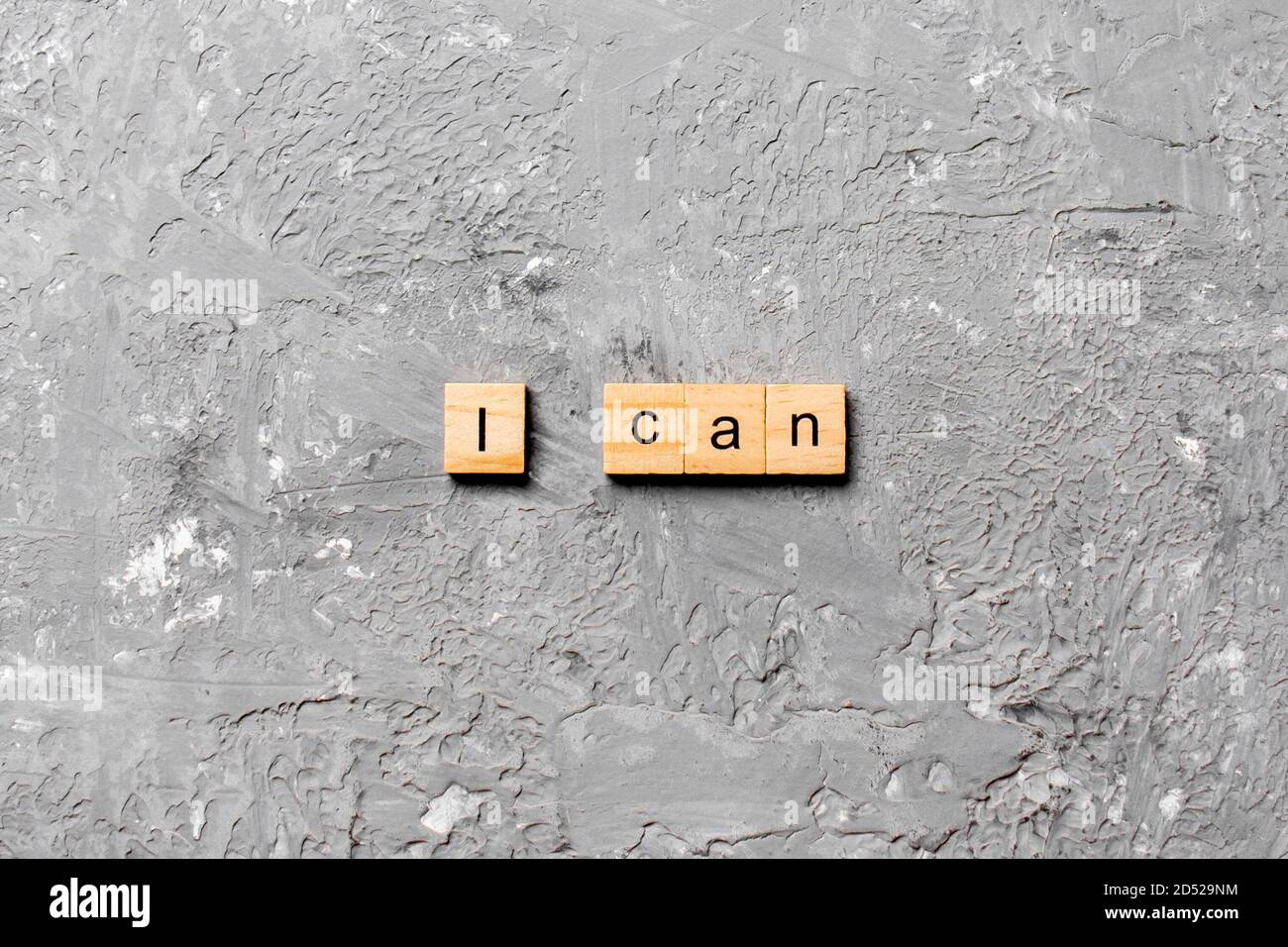 i can word written on wood block. i can text on cement table for your ...