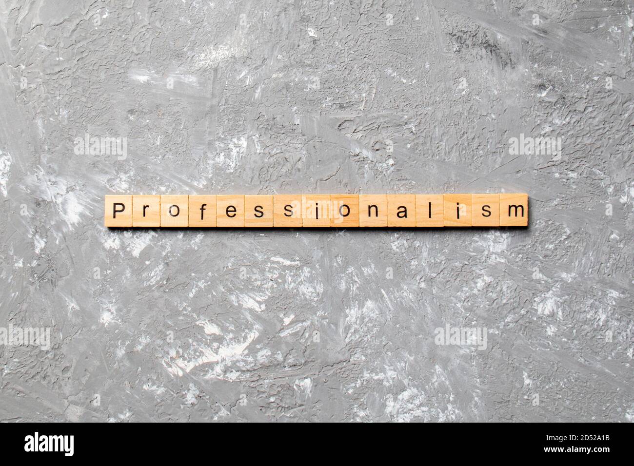 Professionalism word written on wood block. Professionalism text on ...
