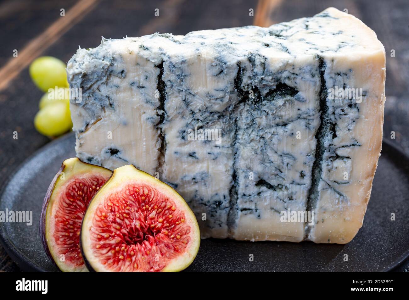 Cheese collection, piece of italian blue cheese gorgonzola picante with ...