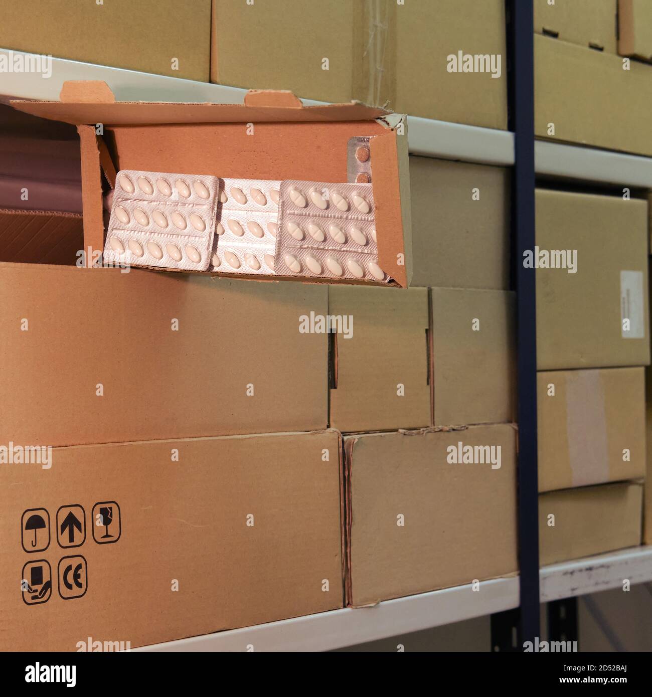 Open box of medicines and tablets in a large warehouse Stock Photo - Alamy