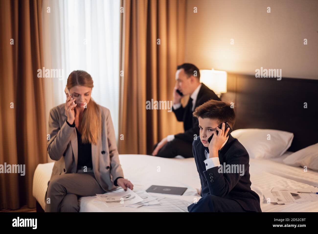 business, technology, internet and hotel concept - business people in ...