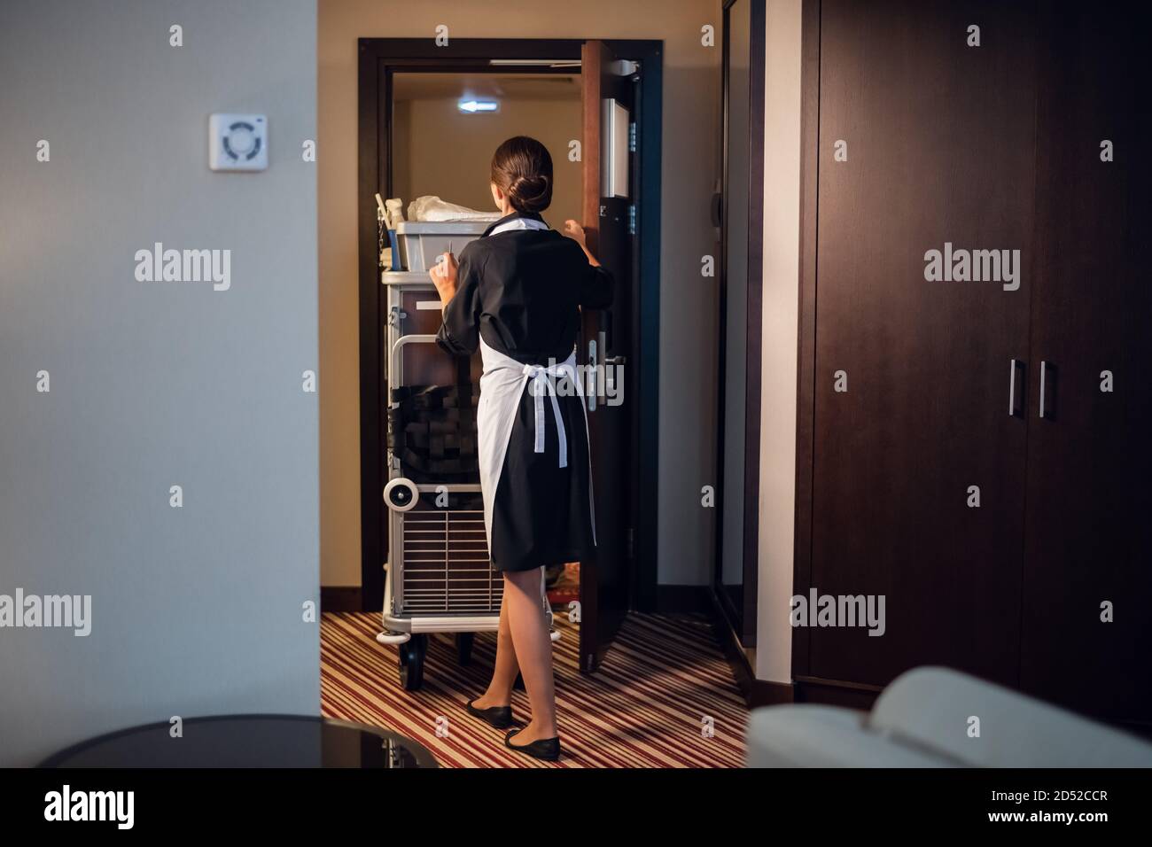 Cleaning lady making bed preparing hi-res stock photography and images ...