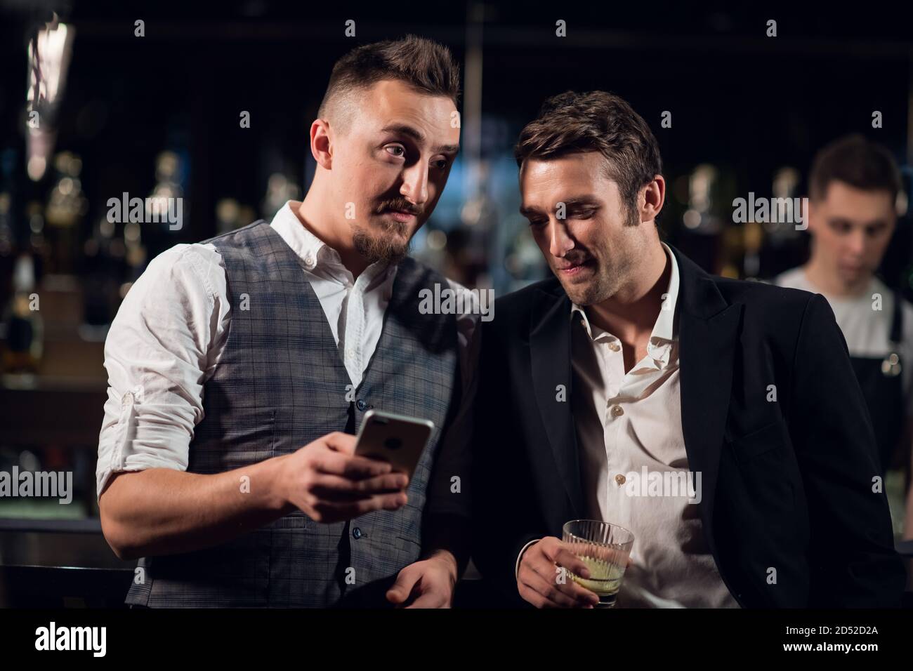 friends meet in a bar and invite friends there, write a message on your ...