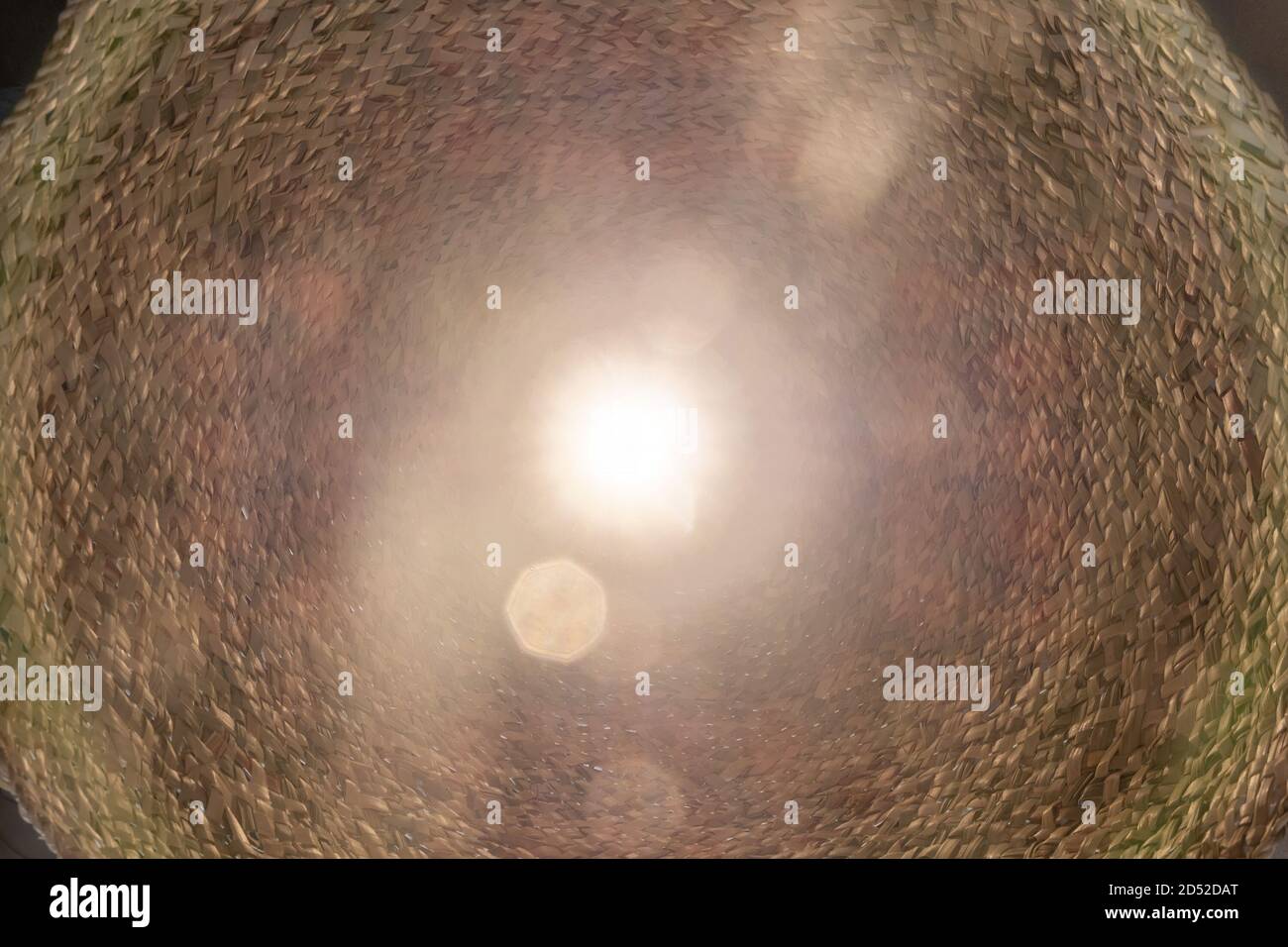 Wicker straw lamp, inside view Stock Photo - Alamy