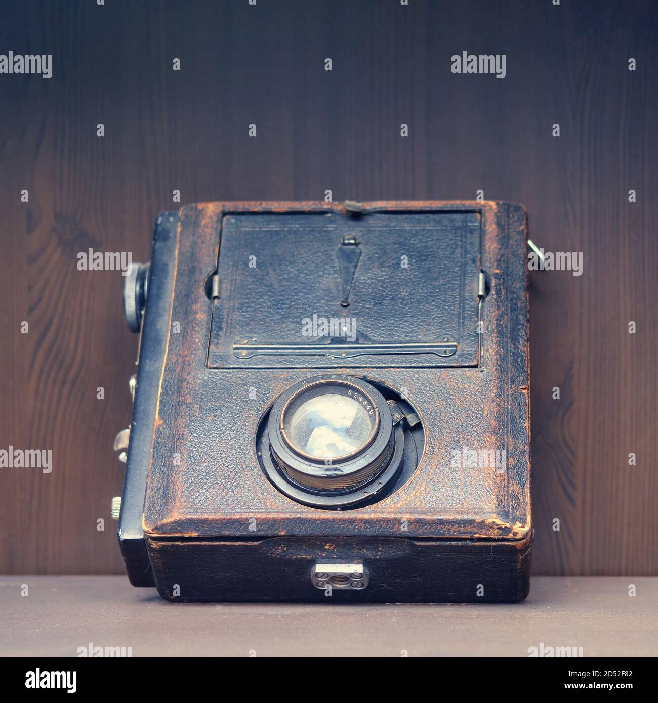 Old camera is on a shelf in a retro closet Stock Photo - Alamy