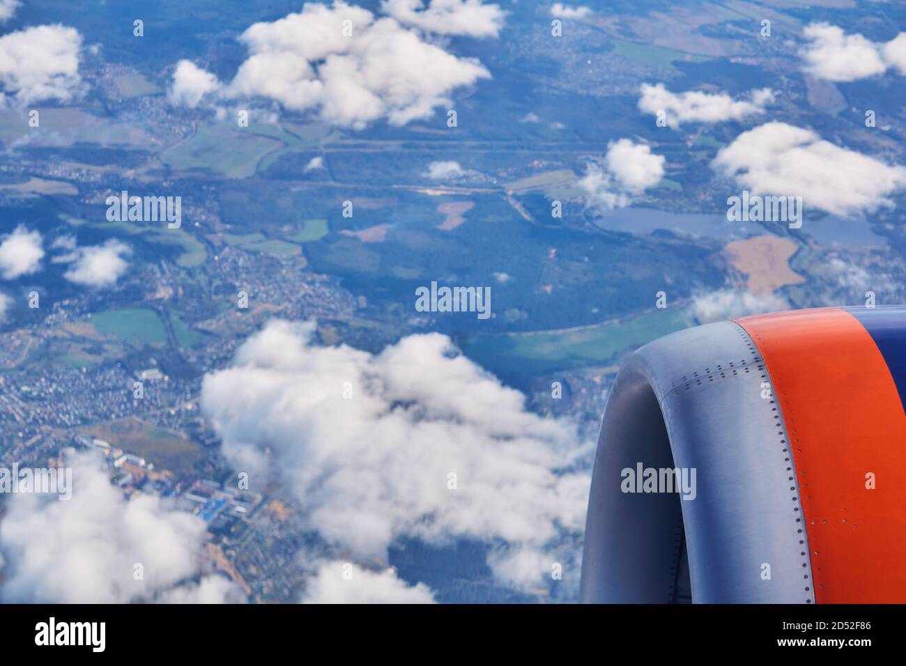 view from the window of a passenger plane, a fragment of the engine is ...