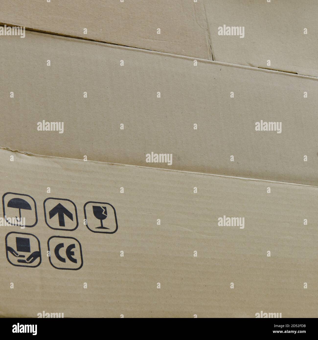 Cardboard mail boxes close-up, brown background Stock Photo - Alamy