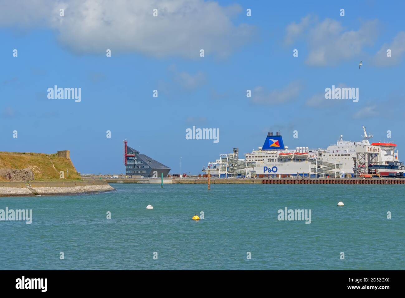 Old fortifications, modern tereminal building and passenger ferry in ...