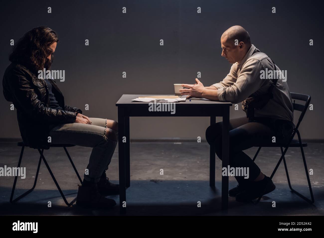 A police detective suspects a white man of committing a crime. Conducts ...