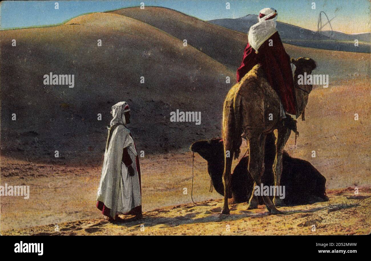 Zwei Araber mit Kamelen in der Wüste, Nomaden | usage worldwide Stock Photo - Alamy
