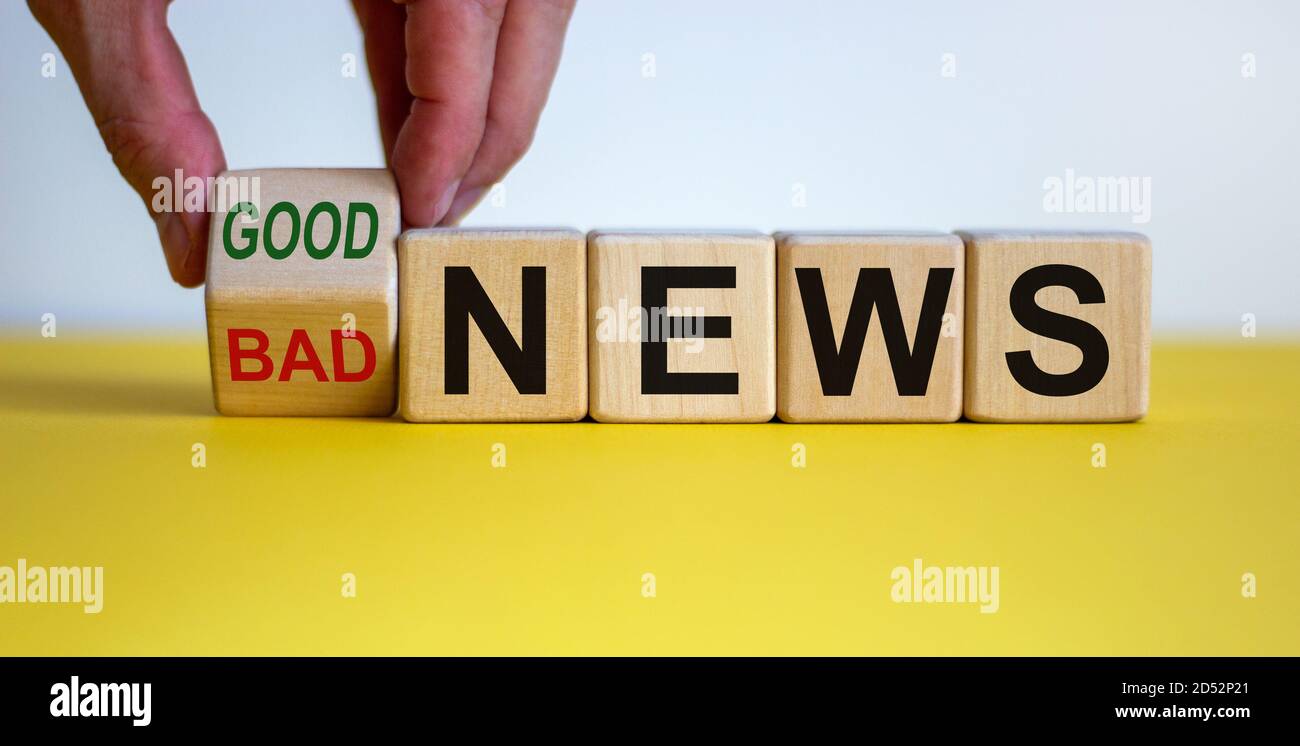 Good or bad news. Hand flips a cube and changes the words 'bad news' to ...