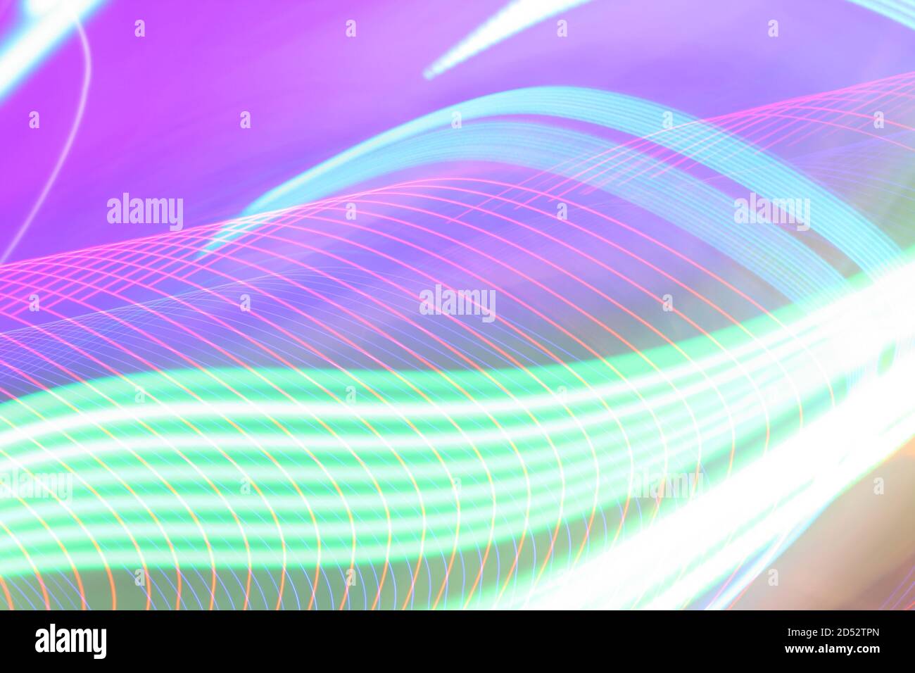 Futuristic background with abstract rhythmic light trails Stock Photo ...