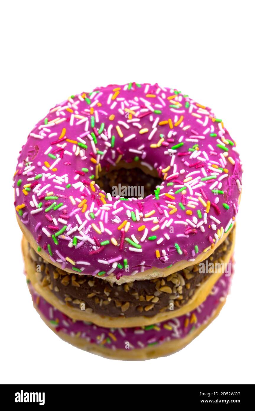 chocolate and berry doughnut, walnut donut on a white background, pink ...