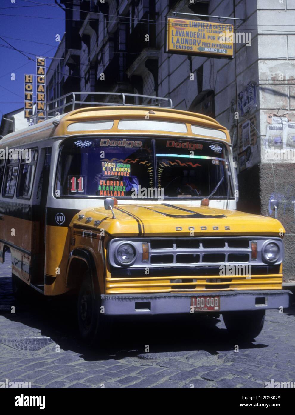 A yellow Dodge minibus, typical of public transport in La Paz, capital ...