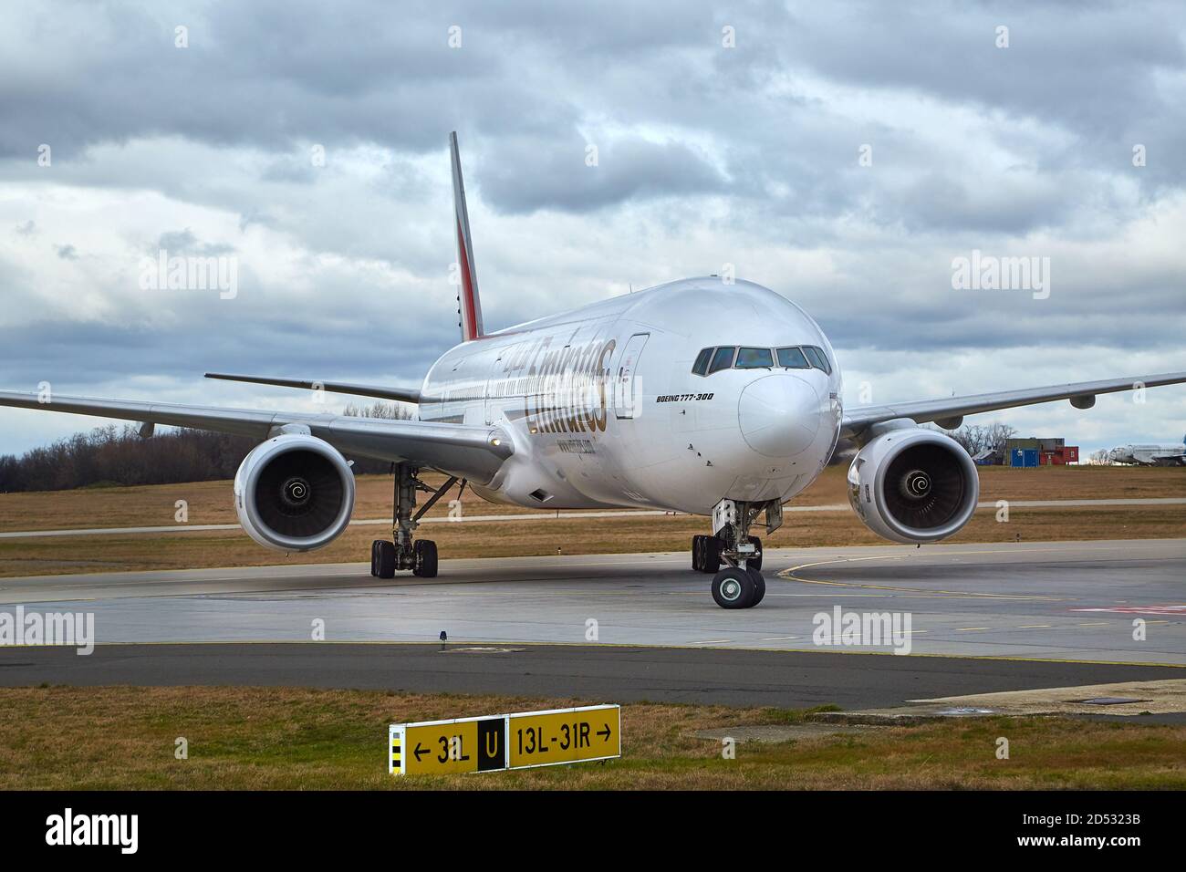 Plane taxiing at airport Stock Photo - Alamy