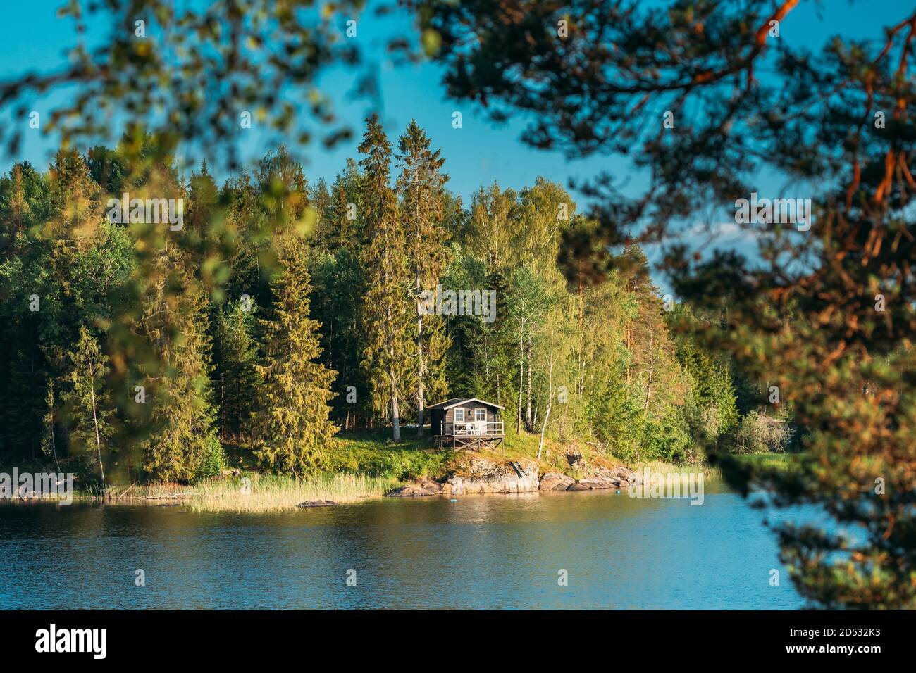 Sweden. Beautiful Swedish Wooden Log Cabin House On Rocky Island Coast ...