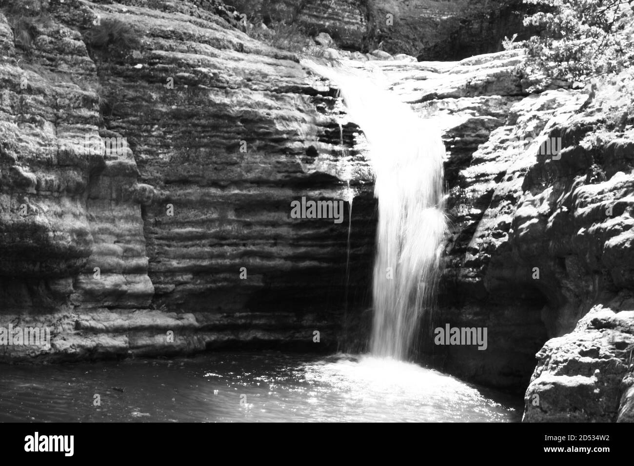 Grayscale shot of a small waterfall in Lastiver, Armenia Stock Photo ...